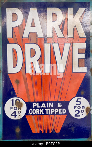 Old metal advert for PARK DRIVE cigarettes adorning a heriatage steam ...