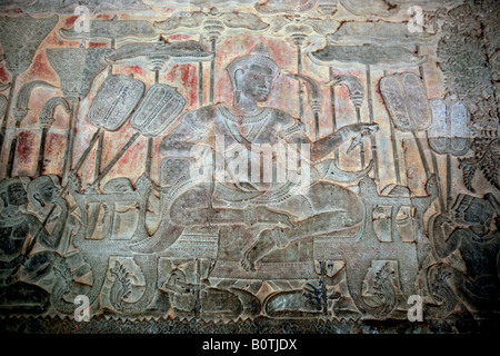 A detail from a frieze depicting battle history on the walls of Angkor ...