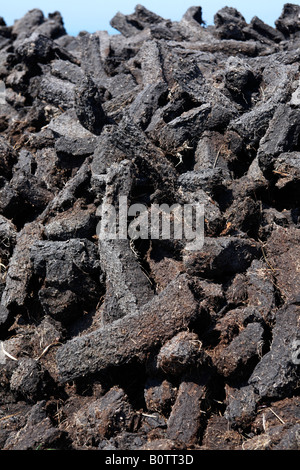 pile of irish peat turf fuel drying in the bog Stock Photo - Alamy