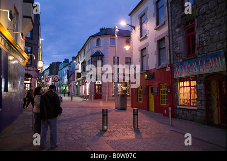 Night street in downtown Galway shining with lights all night long with ...