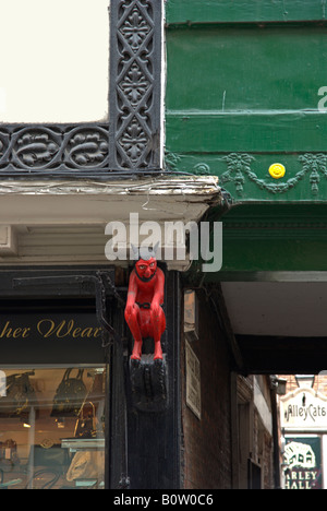 Red devil statue Stonegate York May 2008 Stock Photo - Alamy