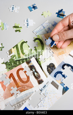 European currency jigsaw puzzle Stock Photo - Alamy