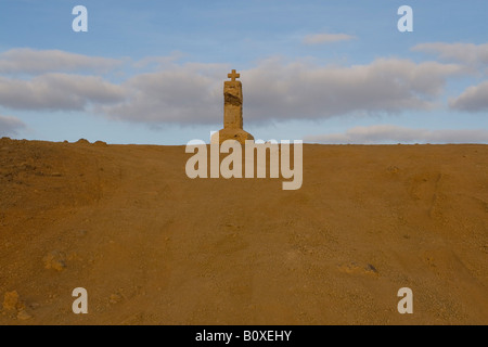 Christian monument at barren rock in Pedra de Lume, Sal, Cape Verde ...