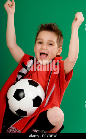 boy as Austrian soccer fan, with football and funny hat Stock Photo - Alamy