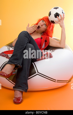 bored, female soccer fan Stock Photo - Alamy