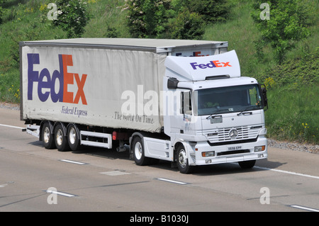 A FedEx UK articulated lorry travelling along the Kingsway Dual ...