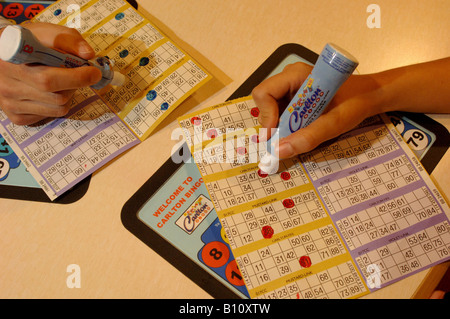 People marking bingo cards Stock Photo - Alamy