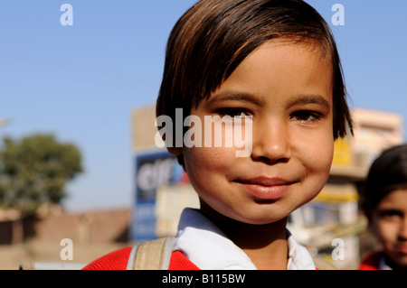 Indian school girls traditional hair style with plaits, bows and a ...