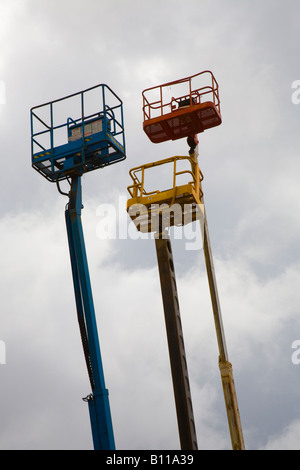 A red cherry picker high access lift on a warship in port Stock Photo ...