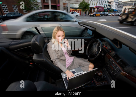 Business Woman Working On Convertible Hybrid Laptop Computer Stock ...