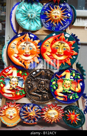 Ceramic sun figures outside souvenir shop, Taormina, Sicily, Italy ...