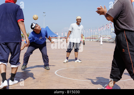 Playing traditional Malay game of Sepak Raga in Terengganu, Malaysia ...