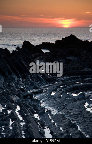 Sunset on the dramatic coastline of Hartland Quays North Devon Stock ...