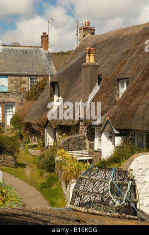 The fishing harbour in the village of Cadgwith, Cornwall, England with ...