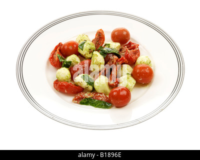 Mozzarella and Sunblush Tomato Salad Stock Photo - Alamy