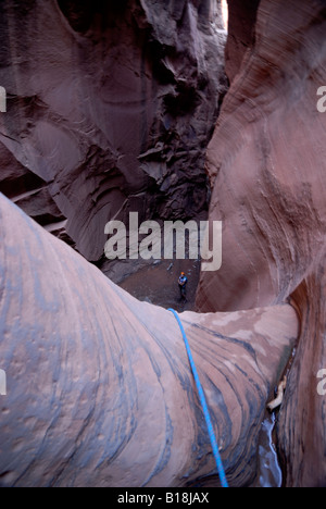 Rope hanging down a cave for canyoning on the slick roack trail near ...