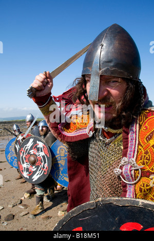 Viking helmet with chain mail in a black mannequin on white background ...