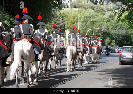 troop of mounted Carabinieri police in ceremonial uniform riding ...