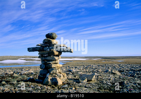 Canada, Nunavut Territory, Inukshuk rock sculpture on Marble Island ...