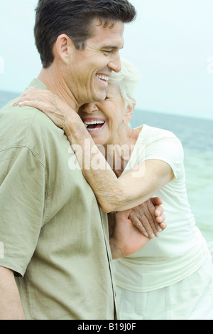 Senior person's hands holding an empty wallet, symbolizing poverty and ...