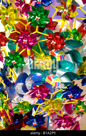 coloured beach toy windmills Stock Photo - Alamy