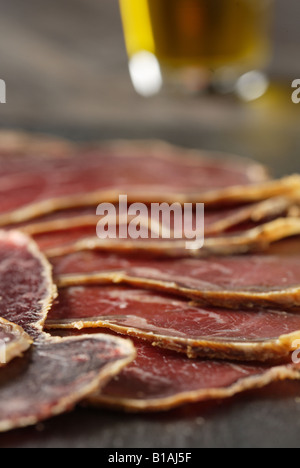Slices of Cecina from Leon (air dried and smoked cured beef made from ...