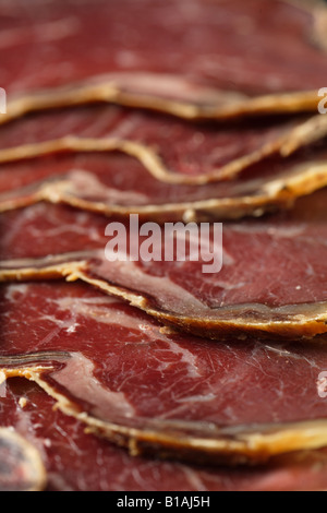 Slices of Cecina from Leon (air dried and smoked cured beef made from ...