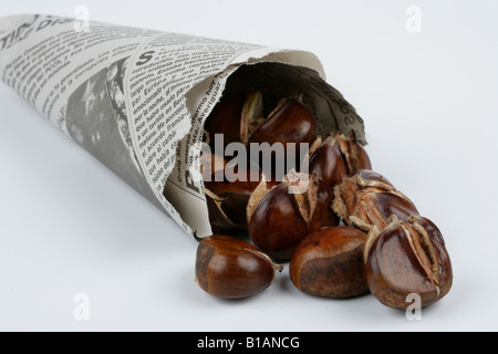 Roasted chestnuts in a newspaper cone Stock Photo - Alamy