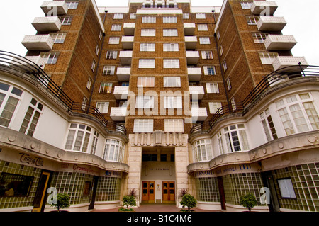 Art Deco mansion block entrance, London. Traditional British 1930's ...