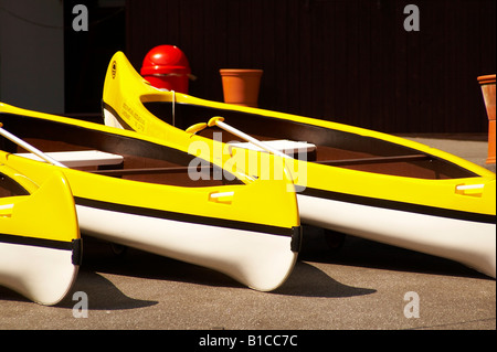 Yellow rowing boat at a landing stage Stock Photo - Alamy