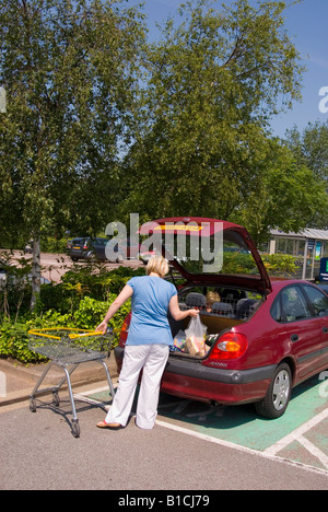 Woman Loading Car At Morrisons Store At Beccles,Suffolk,Uk Stock Photo ...