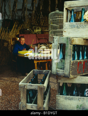man working in barn Stock Photo - Alamy