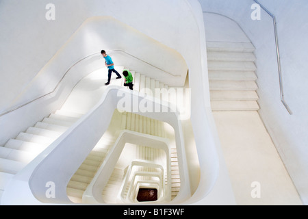 CaixaForum main stair, a white concrete architectural work by Herzog ...