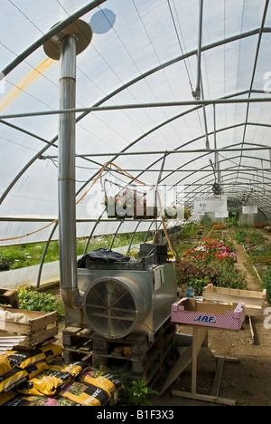 greenhouse heating system with chimney Stock Photo - Alamy