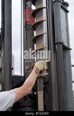 Tower of hollow stem auger drilling rig Stock Photo - Alamy