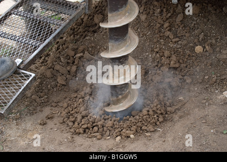 Tower of hollow stem auger drilling rig Stock Photo - Alamy