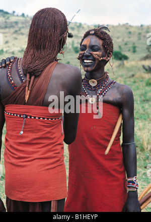 Two Maasai moran warriors greeting each other Masai Mara National ...