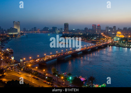 The 6th of October bridge over the Nile River at dusk in Cairo Egypt ...
