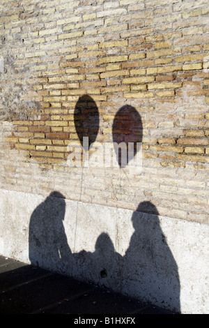 two balloons shadow against wall Stock Photo - Alamy