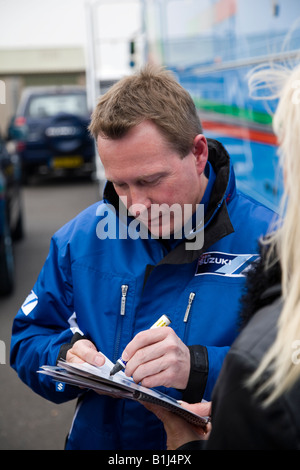 John Reynolds British Superbike Champion 2004 limbers up before a race ...