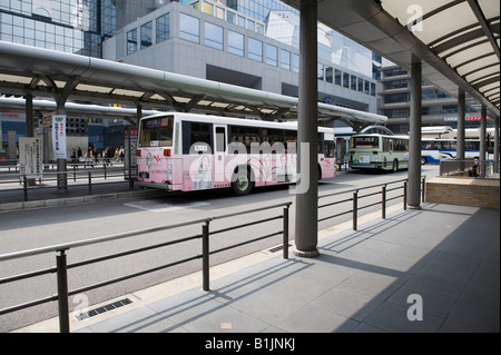 Kyoto, Japan. The busy central bus station, outside the main railway ...