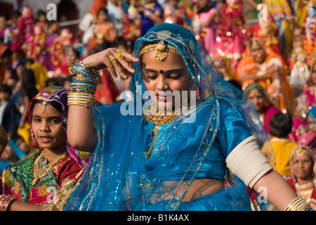 A Rajasthani girl dressed in her finest clothing and jewelry to ...