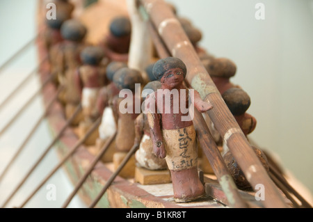 Ancient Egyptian model of a funerary boat with oarsman and a sarcopagus ...