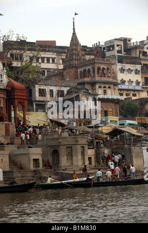Early morning ablutions on the banks of the Ganges at Varanasi Uttar ...