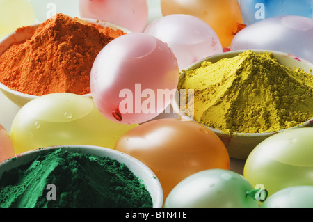 Close-up of water bombs and bowls of powder paint Stock Photo - Alamy