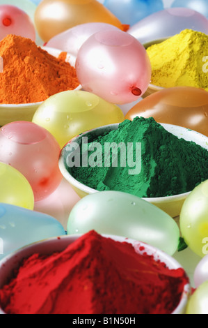 Close-up of water bombs and bowls of powder paint Stock Photo - Alamy