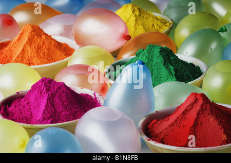 Close-up of water bombs and bowls of powder paint Stock Photo - Alamy