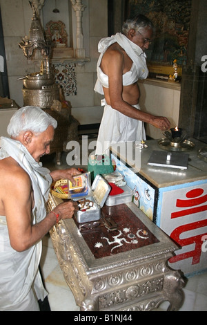 Jain priest praying , Parasvanathaswami Jain Temple , Bangalore , South ...