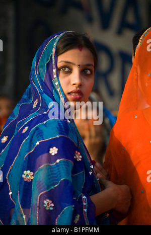 A Rajasthani girl in her finest clothing and jewelry to celebrate the ...