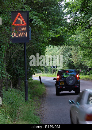 traffic calming warning sign of speed bumps and pedestrians in road ...